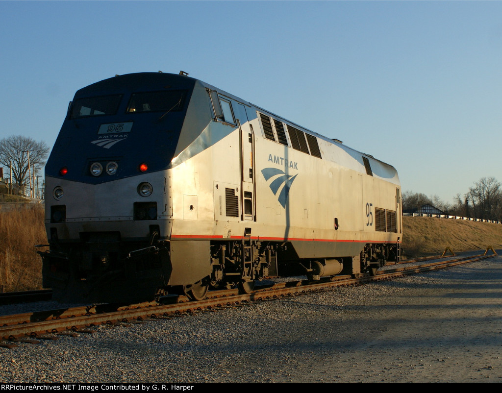 3/4 view of Amtrak 95 at rest in the small yard at Kemper Street Station